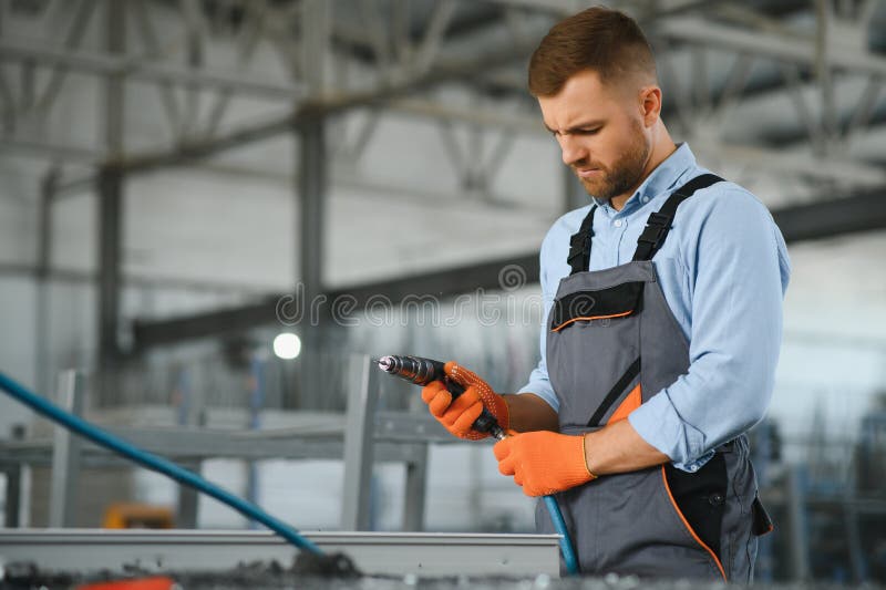 Factory Worker. Man Working on the Production Line. Stock Photo - Image ...