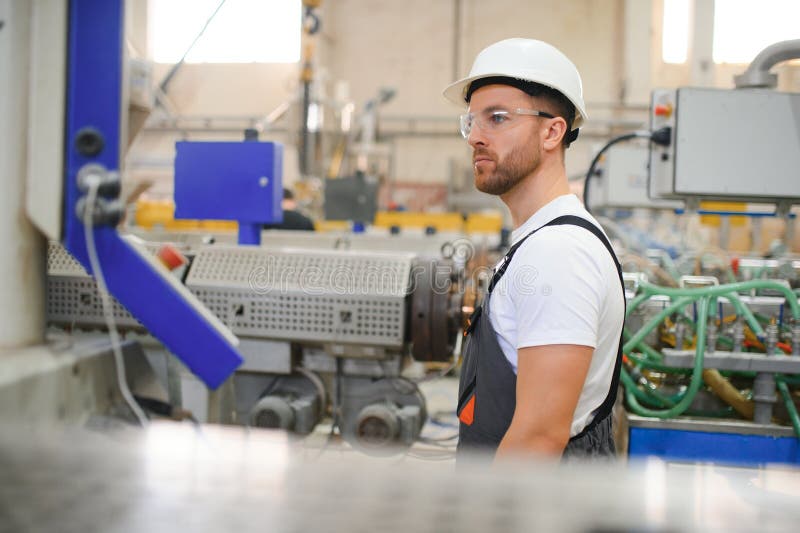 Factory Worker. Man Working on the Production Line Stock Photo - Image ...