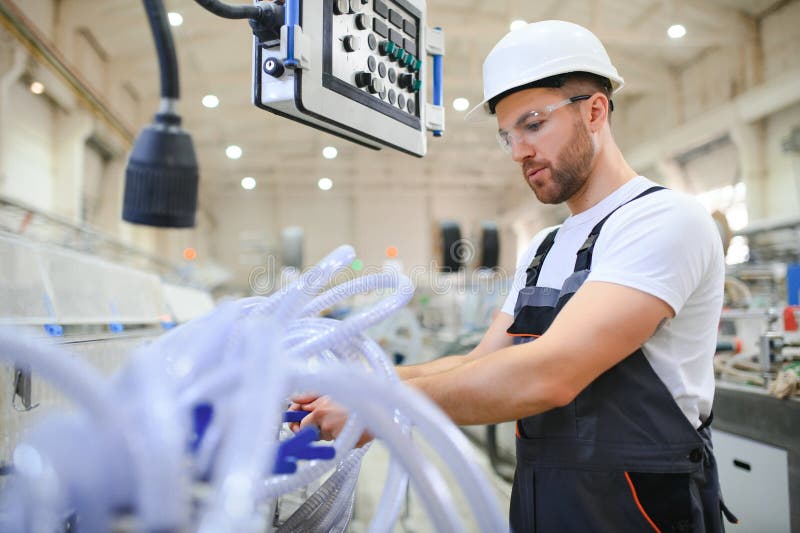 Factory Worker. Man Working on the Production Line Stock Photo - Image ...