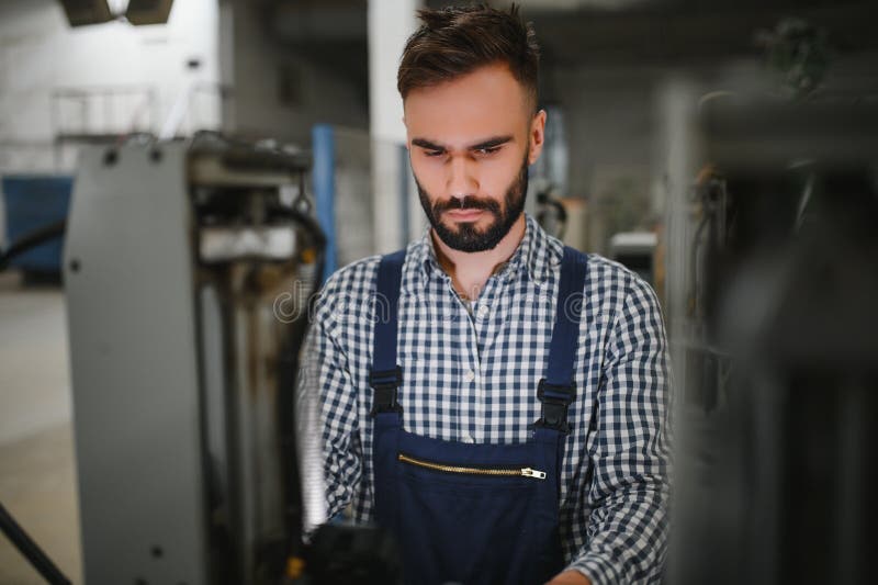 Factory Worker. Man Working on the Production Line. Stock Image - Image ...