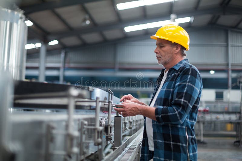 Factory Worker Monitoring Production Line Stock Image - Image of ...