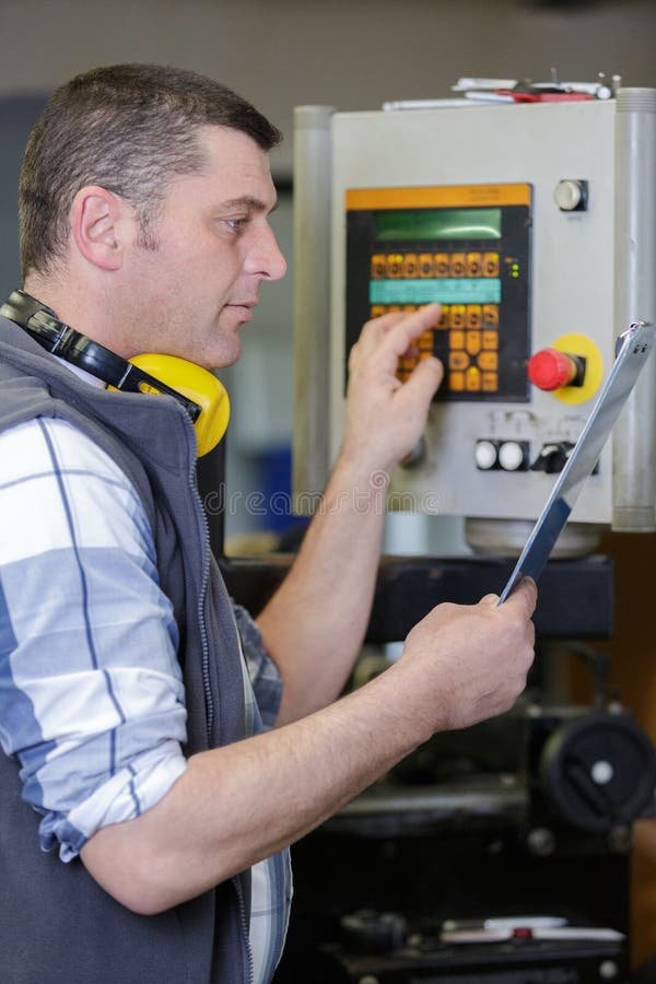 Factory Worker Programming Cnc Milling Machine Stock Image - Image of ... Factory Worker Programming Cnc Milling Machine Stock Image - Image of ...