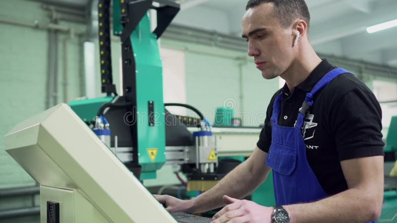 A Factory Worker is Standing at the Control Panel. Stock Footage ...