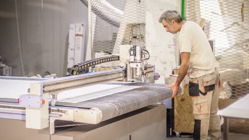 Technician Works on CNC Digital Cutter Machine for Cutting Textile ...