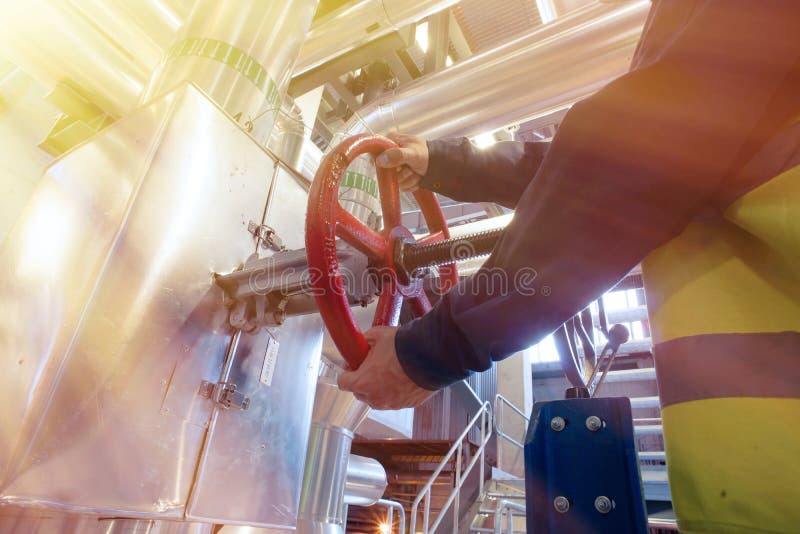 Factory Worker Turning Valve Stock Photo - Image of gasoline, fixtures ...
