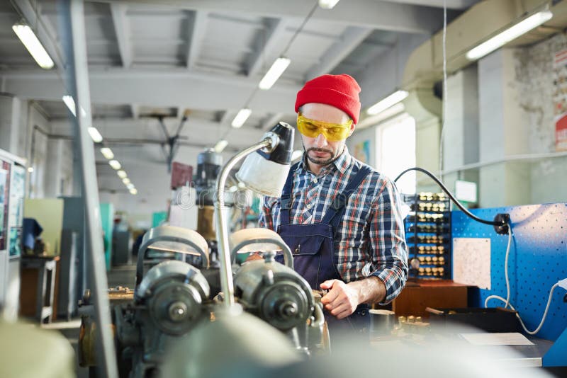 Factory Worker Using Machines Stock Image - Image of career, making ...