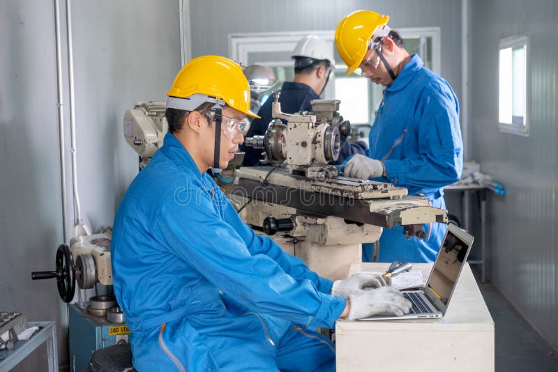 Factory Worker Man with Blue Uniform and Yellow Hard Hat Work with ...
