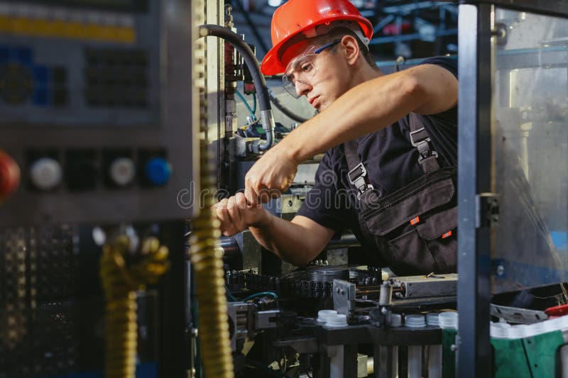 325 Workers Fixing Industrial Machinery Stock Photos - Free & Royalty ...