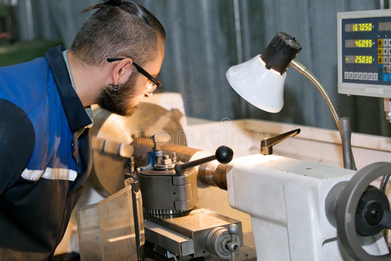 Factory Worker Working on Lathe Machine Stock Photo - Image of ...