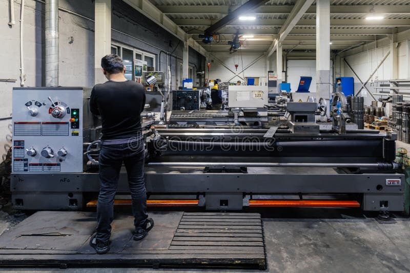 Factory Worker Working on Lathe in Metalworking Workshop Editorial ...