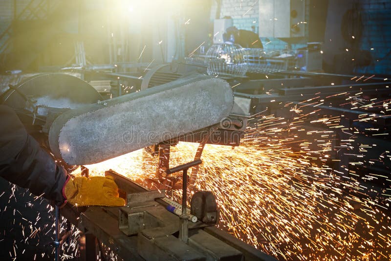A factory worker works stock image. Image of manufacturing - 260944791