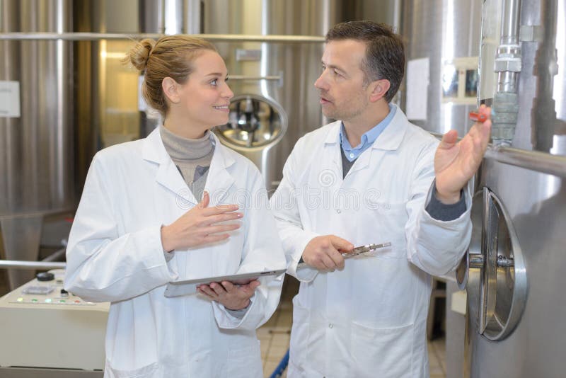 Factory workers in factory stock photo. Image of chemical - 271543550