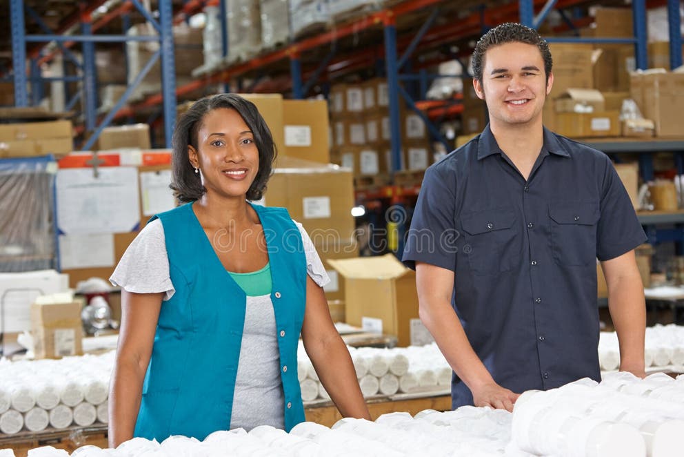 Factory Workers Checking Goods on Production Line Stock Image - Image ...