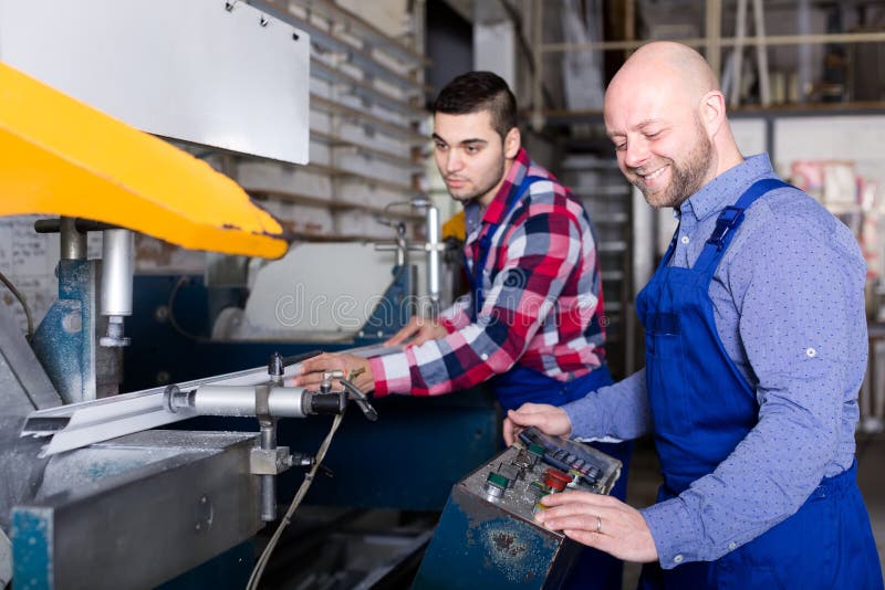 Happy factory workers stock image. Image of american - 45444487