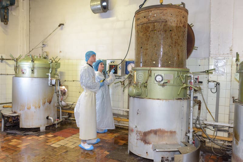 Factory Workers Emptying Pressure Vat Stock Photo - Image of working ...