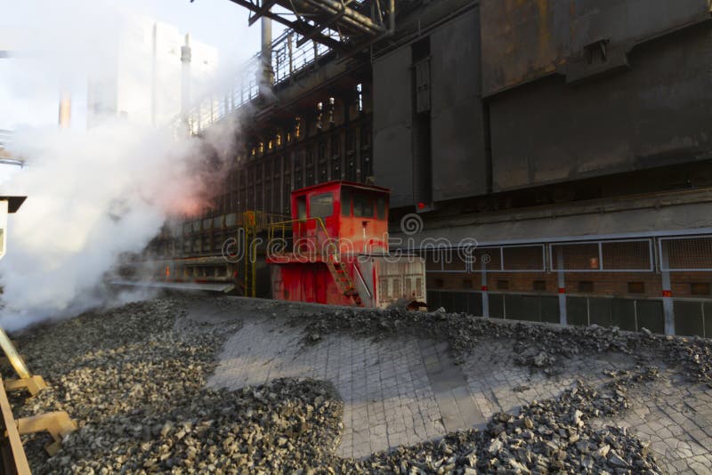 Iron and Steel Producing Factory and Workers Working. Stock Photo ...