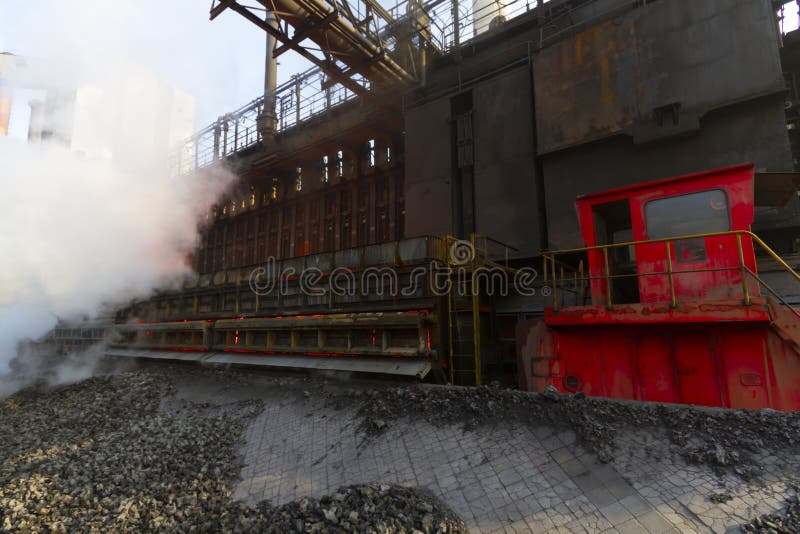 Iron and Steel Producing Factory and Workers Working. Stock Photo ...