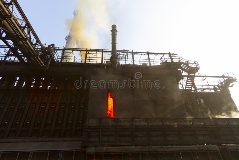Iron and Steel Producing Factory and Workers Working. Stock Photo ...