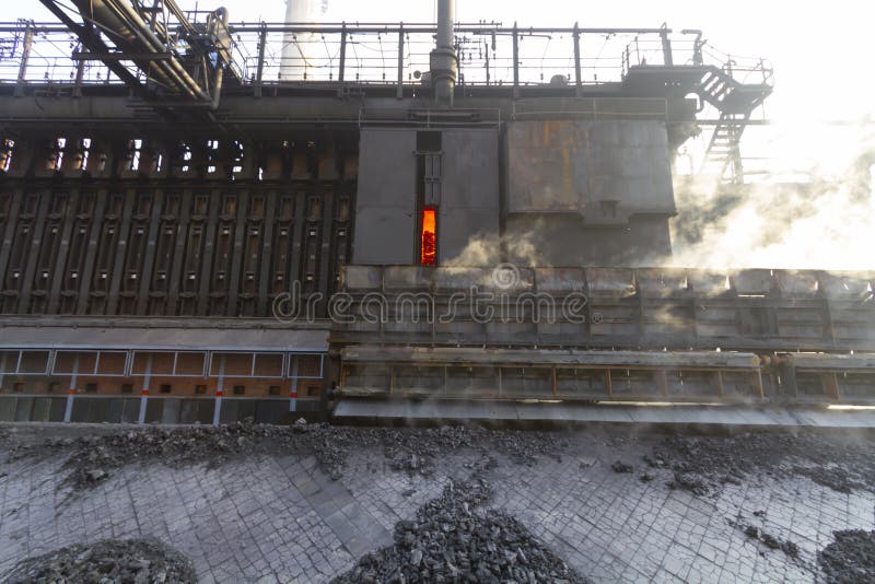 Iron and Steel Producing Factory and Workers Working. Stock Image ...