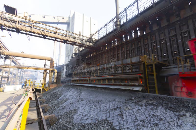 Iron and Steel Producing Factory and Workers Working. Stock Photo ...