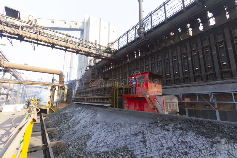 Iron and Steel Producing Factory and Workers Working. Stock Image ...