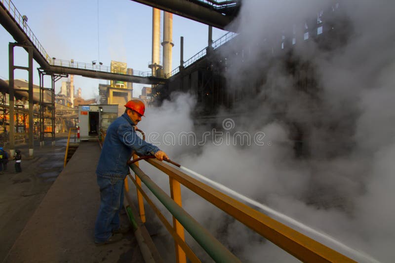 Iron and Steel Producing Factory and Workers Working. Editorial Stock ...