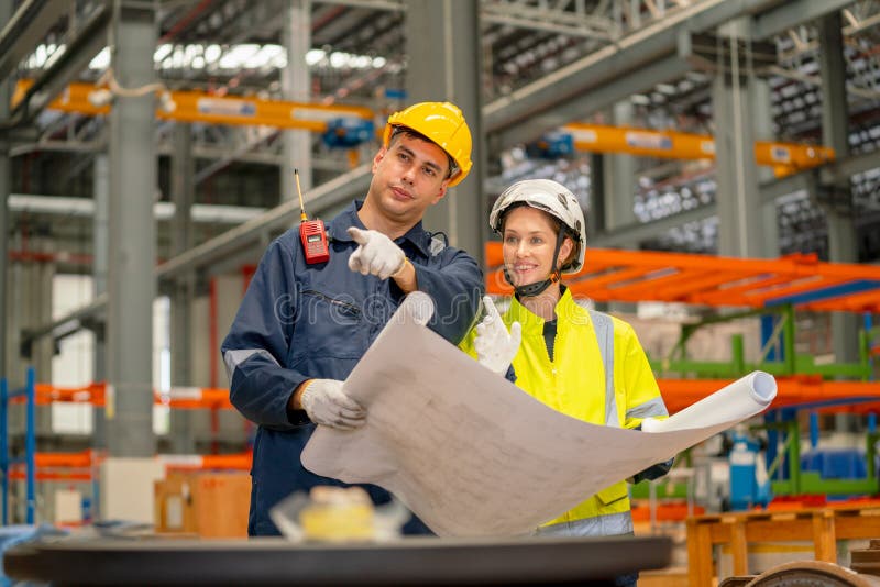 Engineer or Factory Technician Worker Man and Woman Shake Hands for the ...