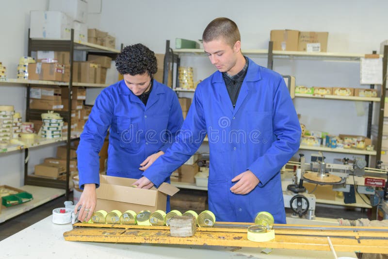 Factory Workers in Storage Room Stock Photo - Image of storeroom, check ...