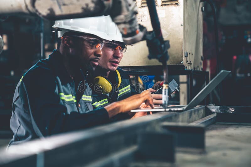 Factory Workers Working with Adept Robotic Arm in a Workshop Stock ...
