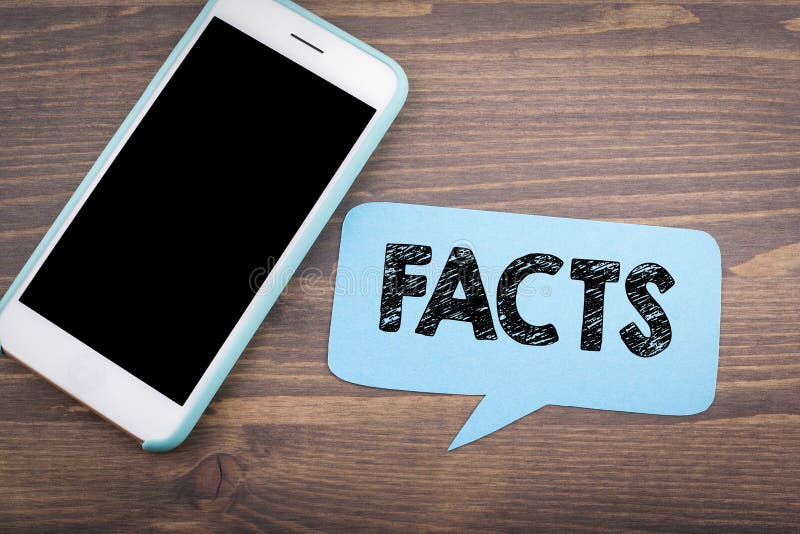Facts Concept. Speech Bubble on a Dark Textured Wooden Background Stock ...