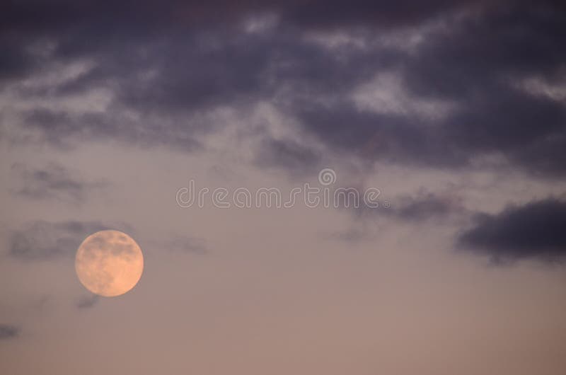 Faded Full Moon during a Cloudy Sunset Day Stock Image - Image of ...
