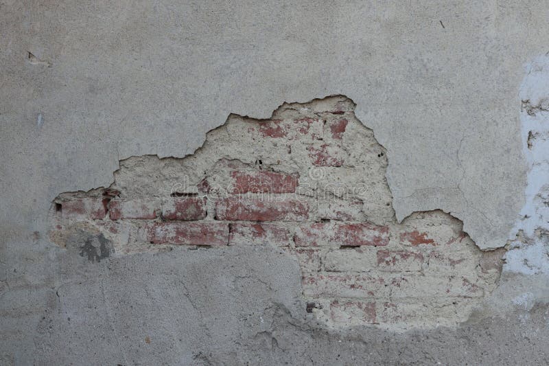 Faded Plaster of a House with Red Bricks in the Base Stock Image ...