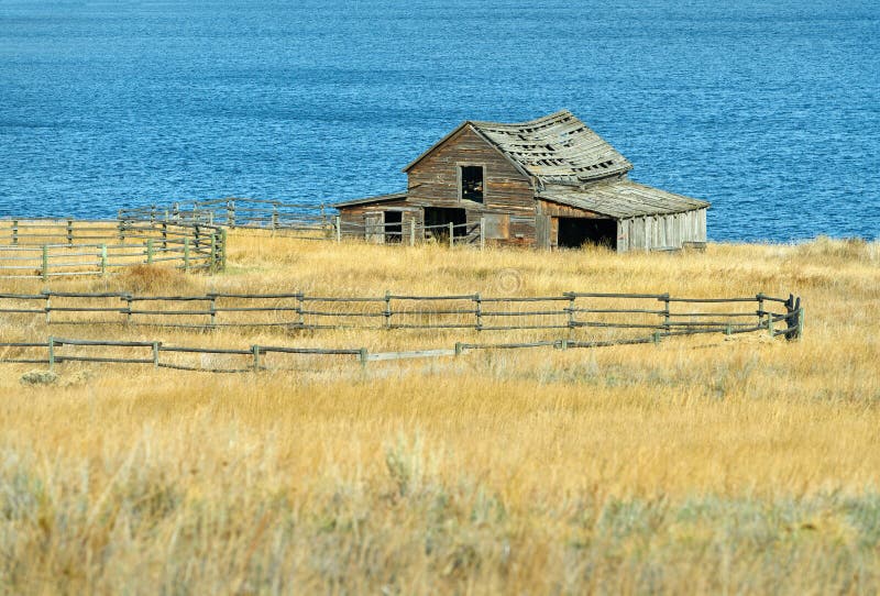 Rustic Barn on Lake stock photo. Image of idyllic, northwest - 239982612