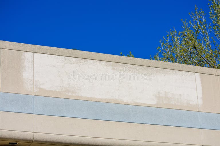 A Faded Rectangular Patch Where Business Signage Was Removed on ...