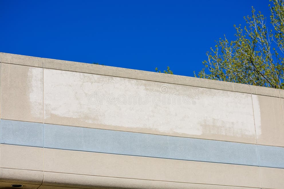 A Faded Rectangular Patch Where Business Signage Was Removed on ...