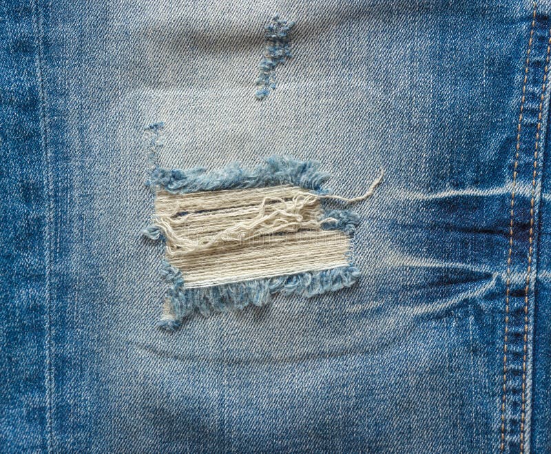 Faded ripped jeans stock photo. Image of edge, beauty - 52192740