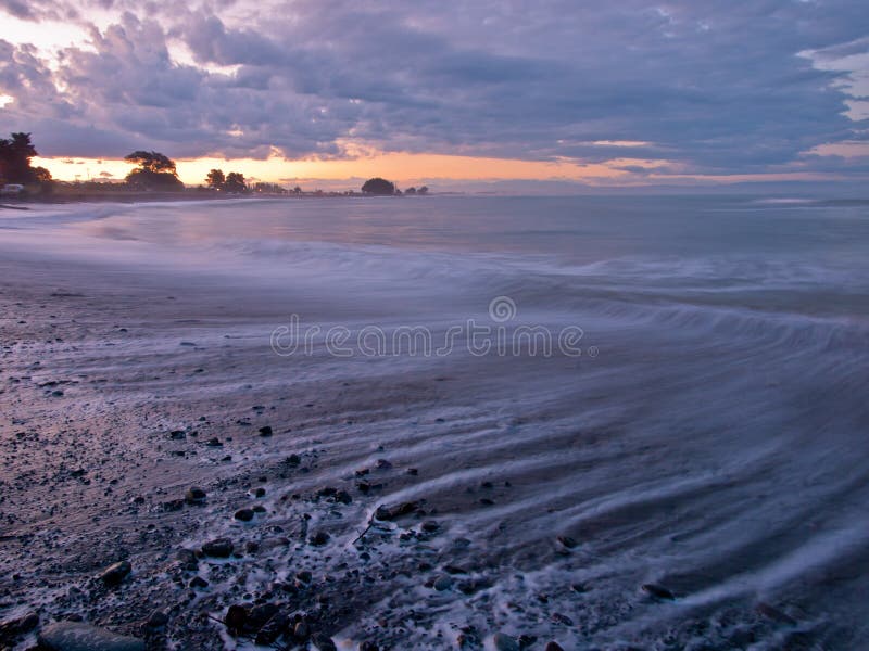 Faded waves on beach stock image. Image of tourism, rocky - 21477453