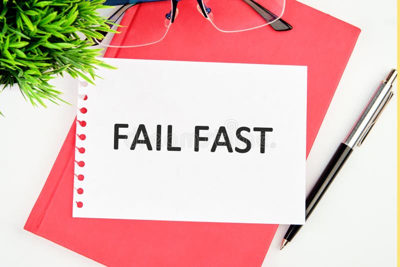 Fail Fast Symbol. Concept Words Fail Fast in a White Notebook on a Red ...