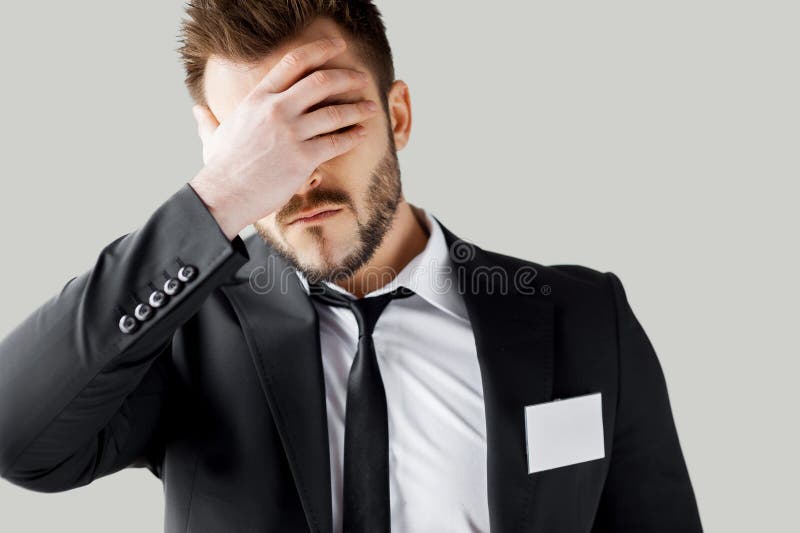 Hiding from his problems. stock photo. Image of confusion - 41876020
