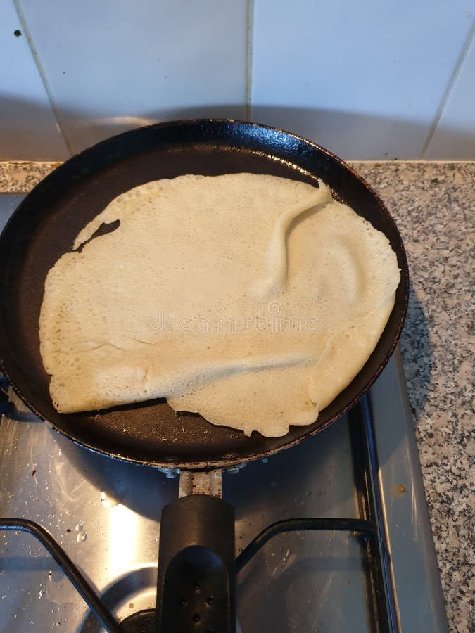 Failed Pancake in the Pan during Baking in a Kitchen with Gas Stock ...