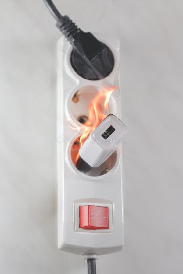 Burning of the Wire Cable and Socket Outlet Plug in the House Blurred ...