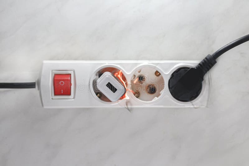Burning of the Wire Cable and Socket Outlet Plug in the House, Blurred ...