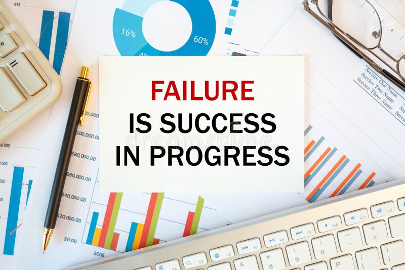 Failure is Success in Progress is Written in a Document on the Office ...