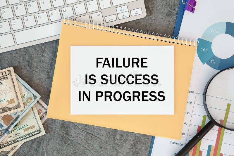 Failure is Success in Progress is Written in a Document on the Office ...
