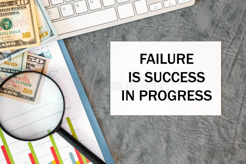 Failure is Success in Progress is Written in a Document on the Office ...