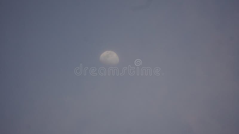Faint Moon Behind Hazy Evening Sky Stock Photo - Image of space ...