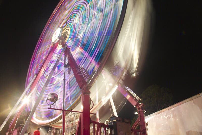 Fair Carnival Ferry Wheel in Speed Stock Photo - Image of carnival ...