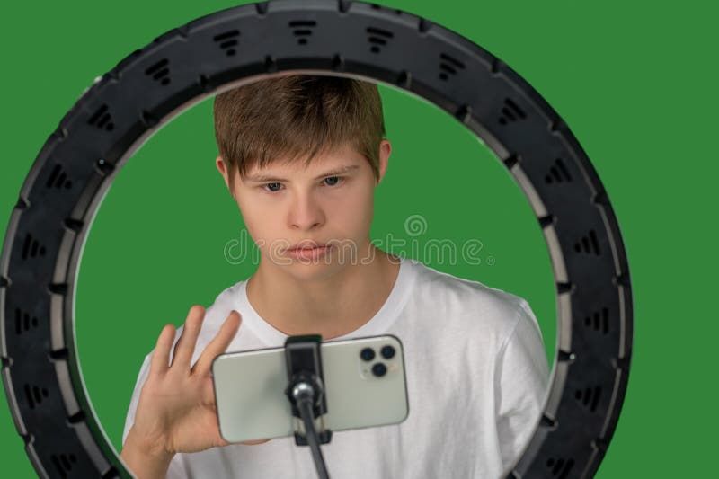 Fair-haired Boy Fixing Camera and Looking Involved Stock Image - Image ...