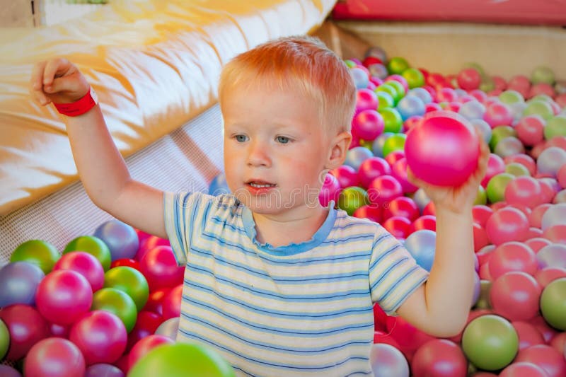 A Fair Haired Boy of Three Years in a Game Center Stock Photo - Image ...
