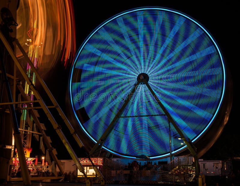 Fair Rides at Night stock image. Image of entertainment - 4837387